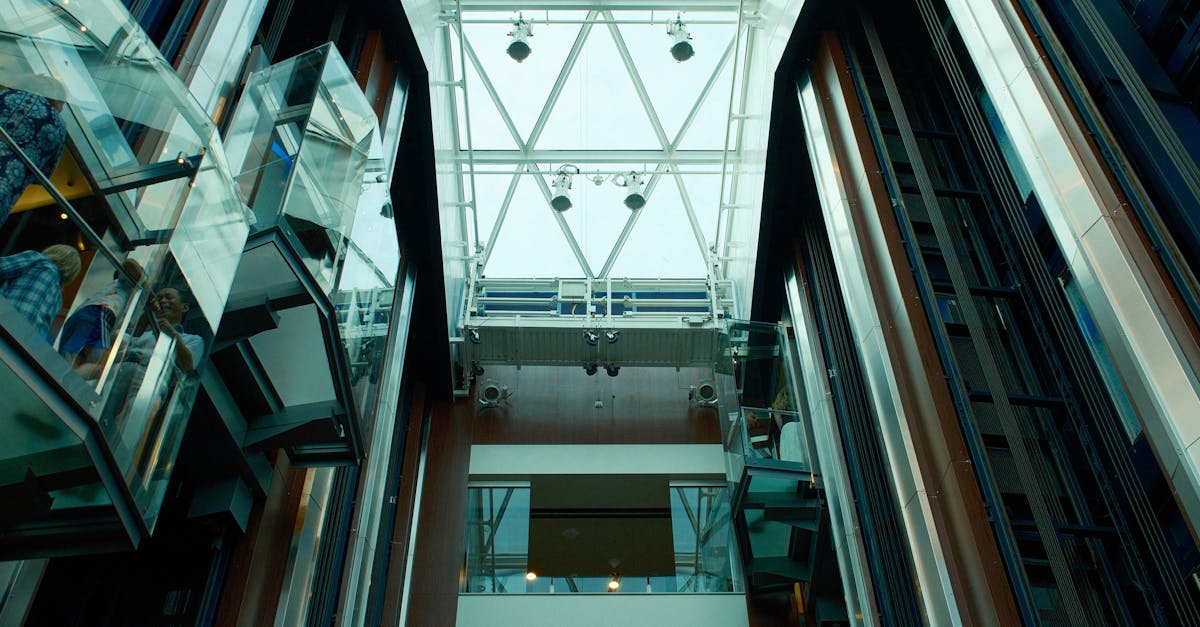 Who can deliver a code-compliant hydraulic elevator package for a new ...